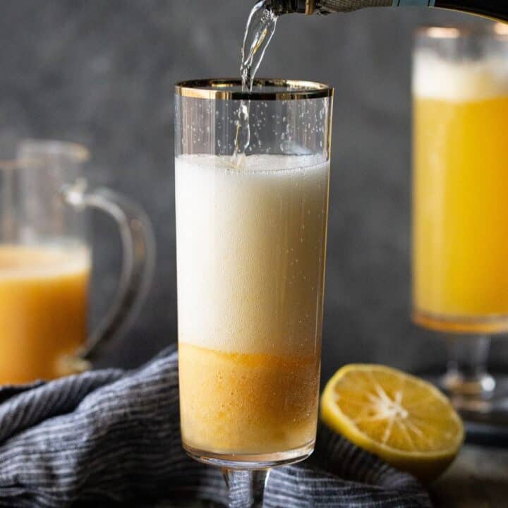 Easy Peach Bellini Recipe (w/mocktail option!) - Garnish with Lemon
