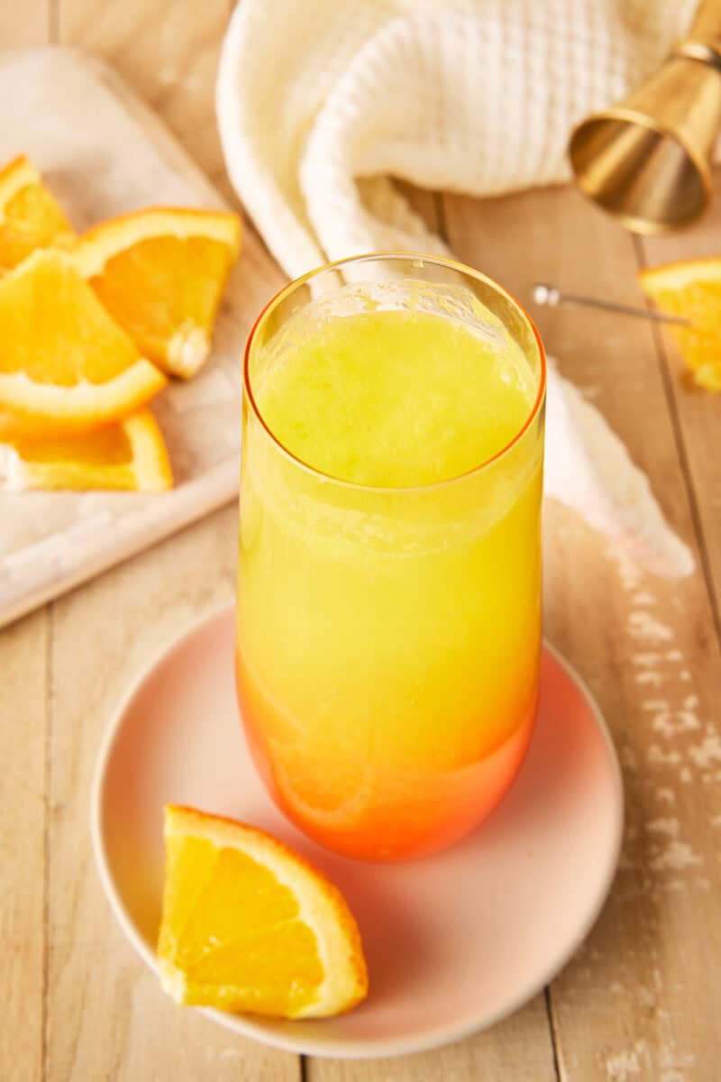 Tequila Sunrise Mimosa - Garnish with Lemon